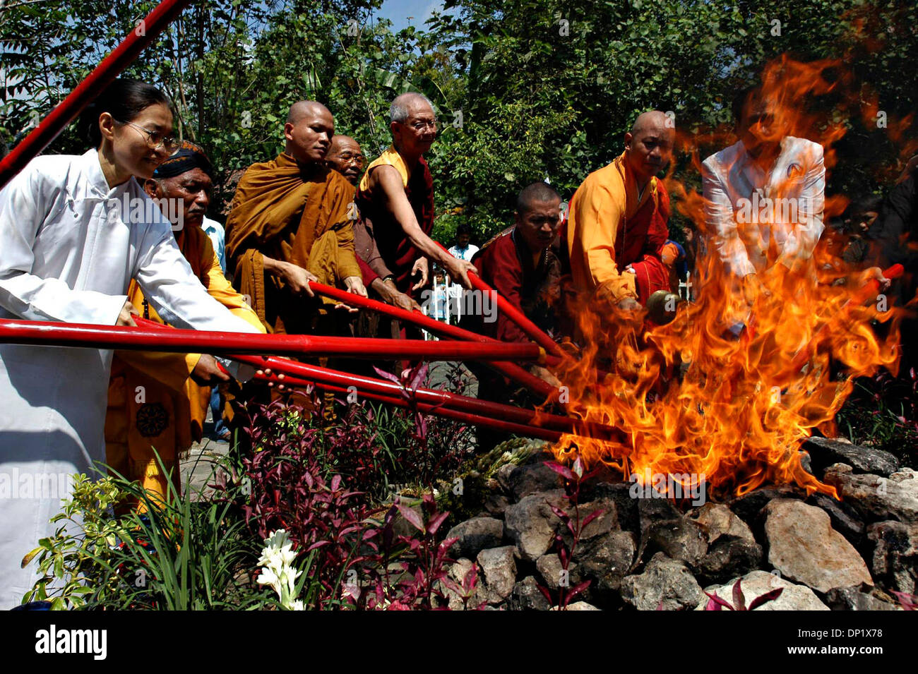 May 11, 2006; Magelang, INDONESIA; Buddhist religious leaders light ...