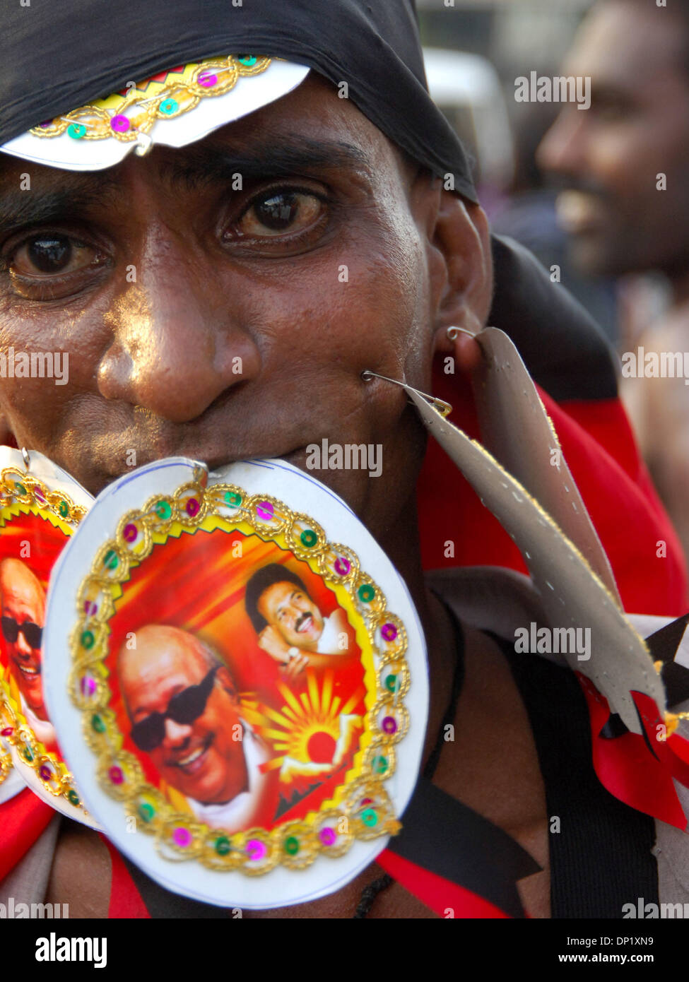 May 11, 2006; Chennai, Tamil Nadu, INDIA; DMK supporters are willing to ...