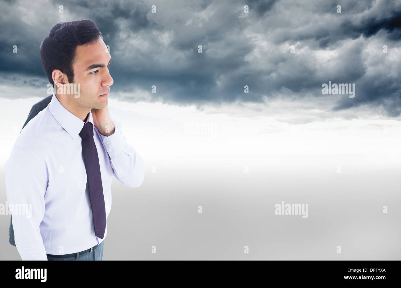 Composite image of unsmiling businessman standing Stock Photo - Alamy