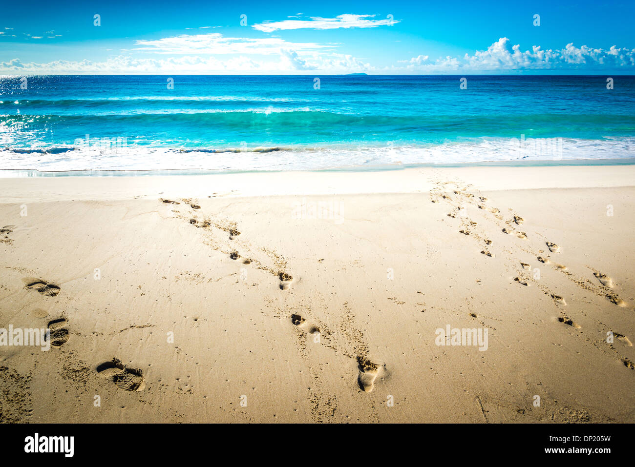 tropical beach with visible footprints Stock Photo - Alamy