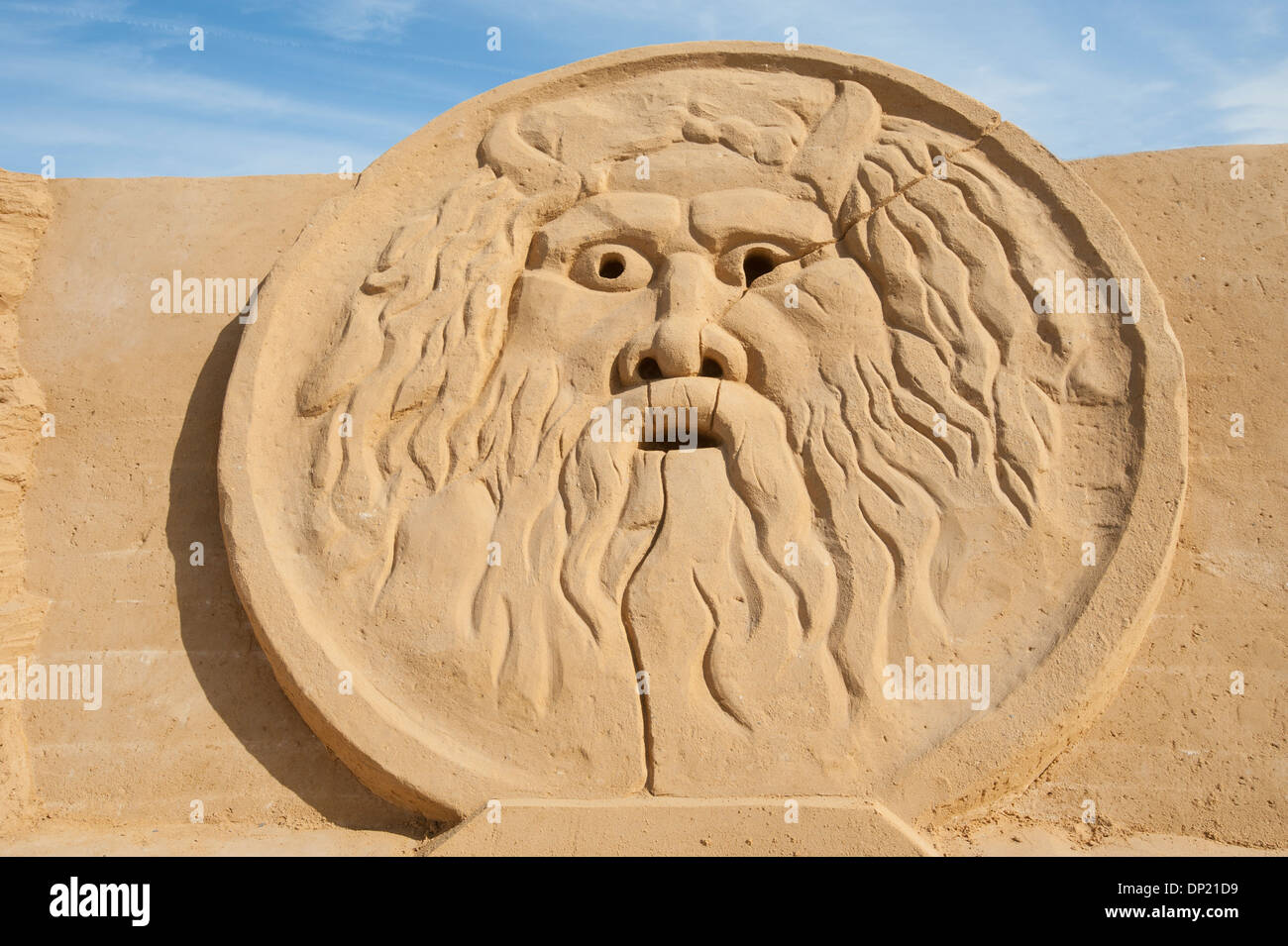 Large sand sculpture of greek god zeus in relief Stock Photo - Alamy