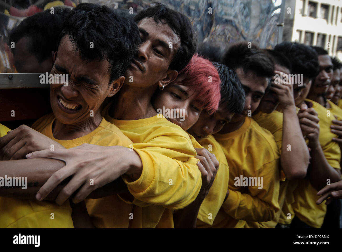 Manila, Philippines. 7th Jan, 2014. Devotees take part in the parade of ...