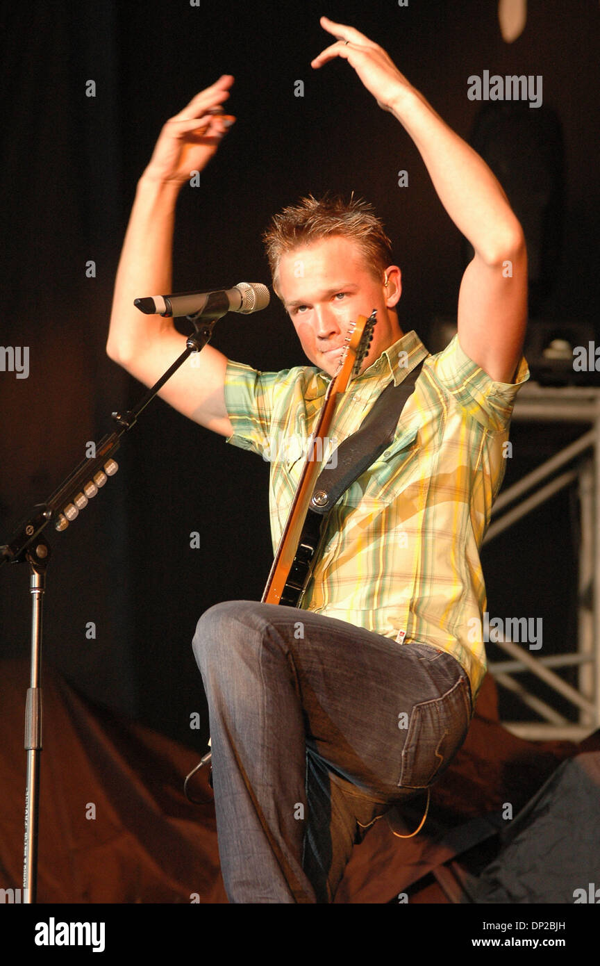 May 28, 2006; San Antonio, TX, USA; DELIA FLORES, lies on the grave of ...