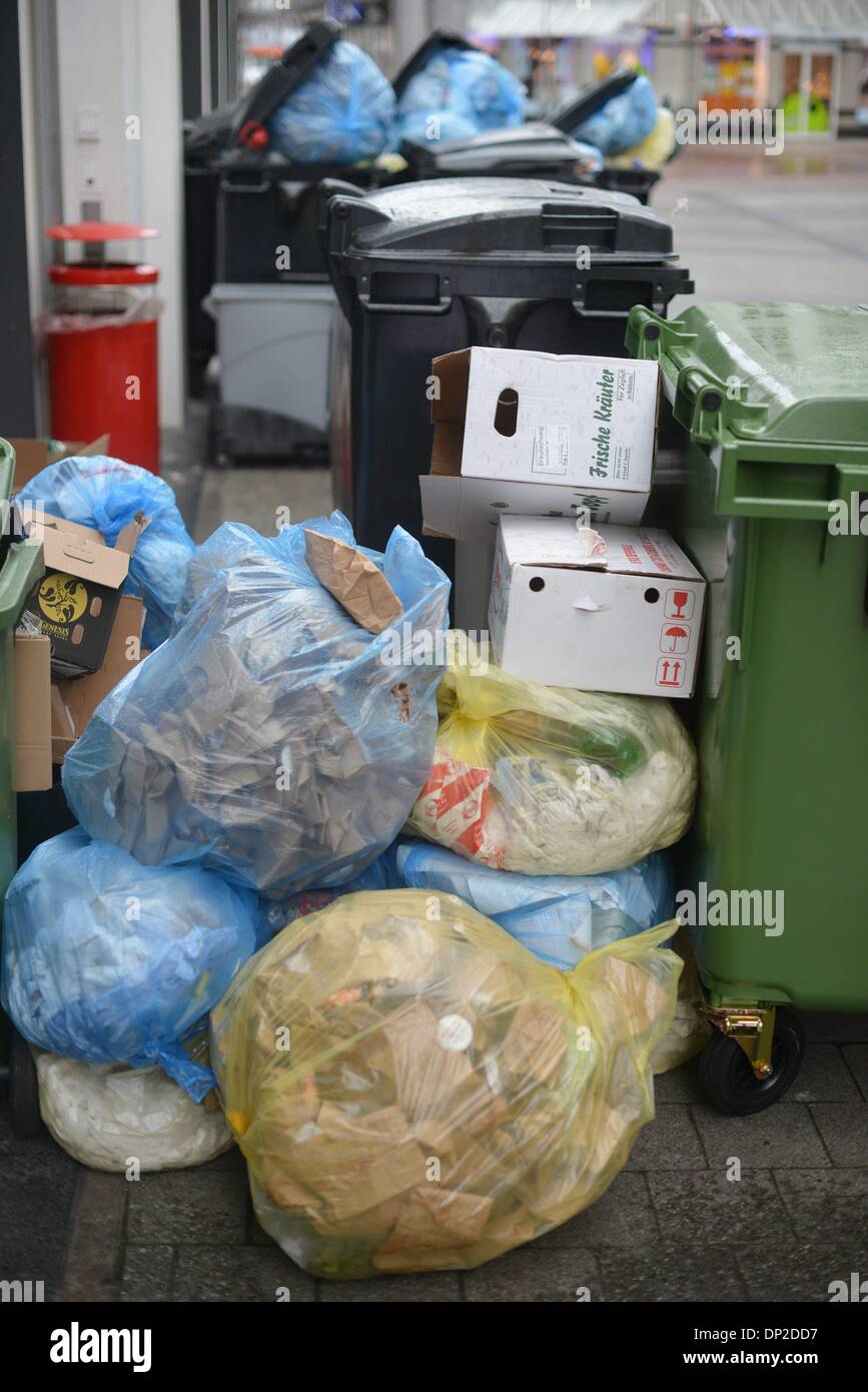 Garbage bags are laying on the street to get picked up from the garbage ...