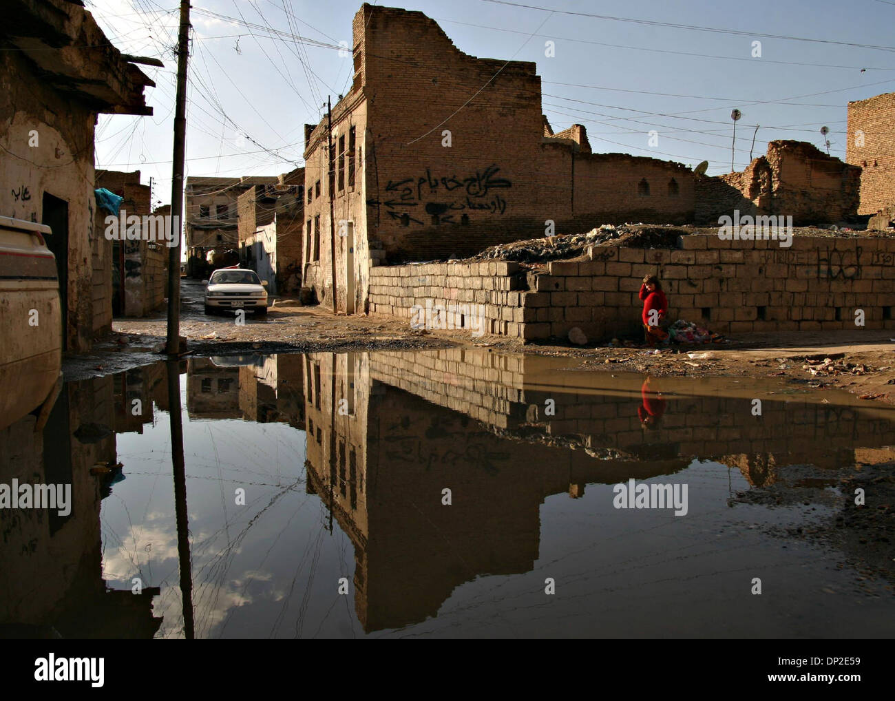 May 31, 2006; Arbil, Kurdistan, IRAQ; A child walks past the large rain ...