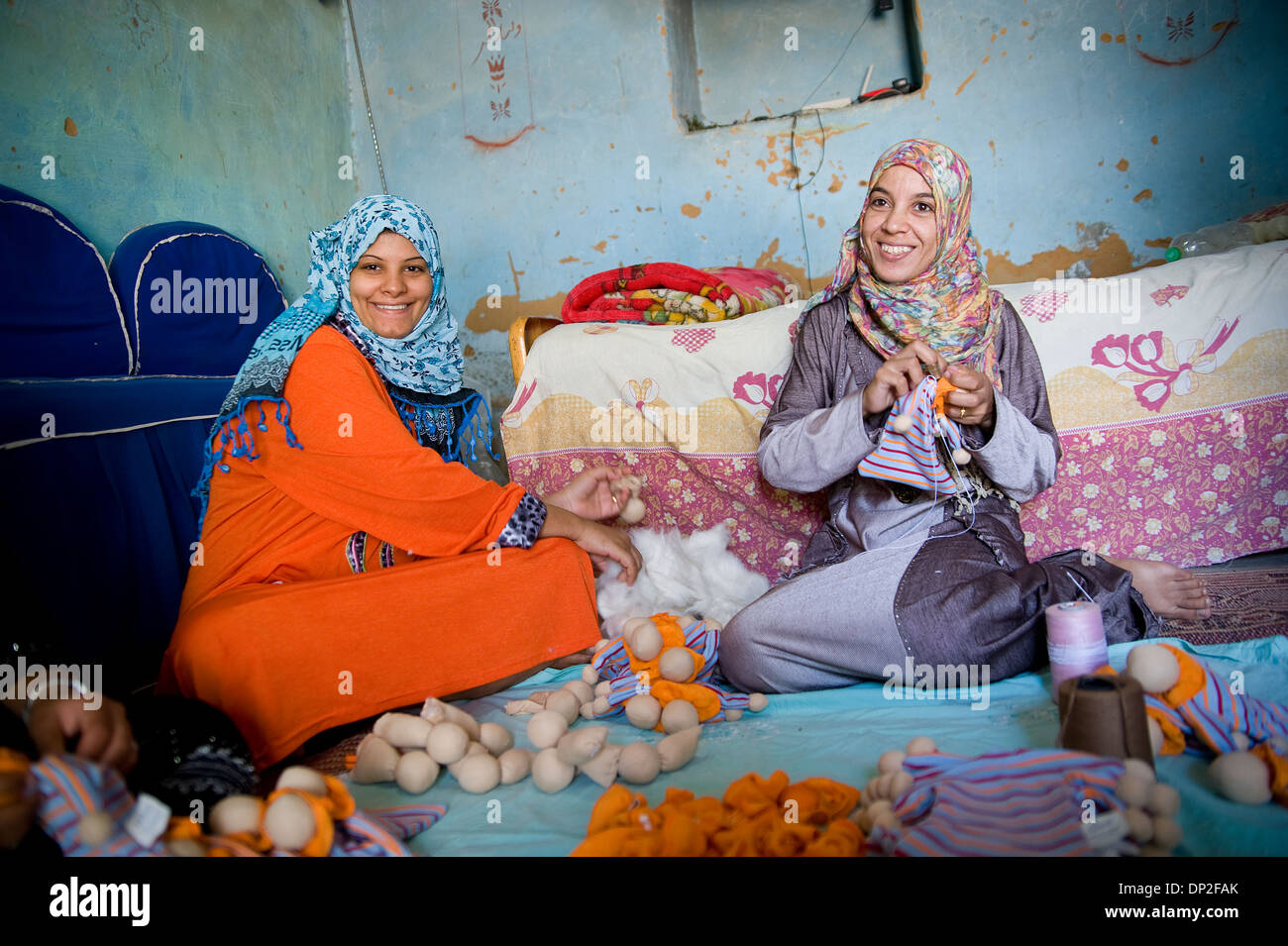 Bilbeis, Egypt: Young Egyptian women working as a seamstress at home ...