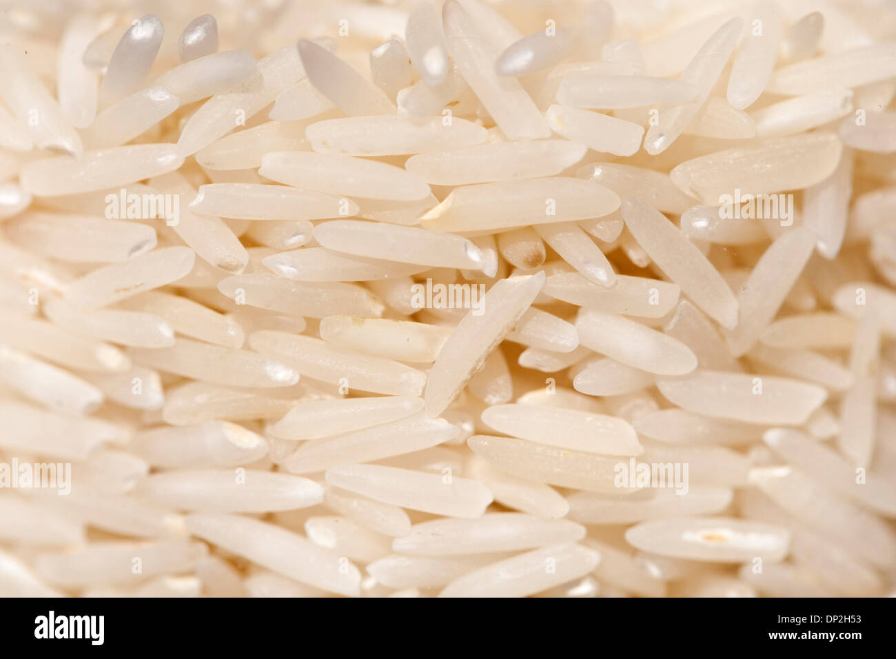 Very close-up view of white long rice Stock Photo - Alamy