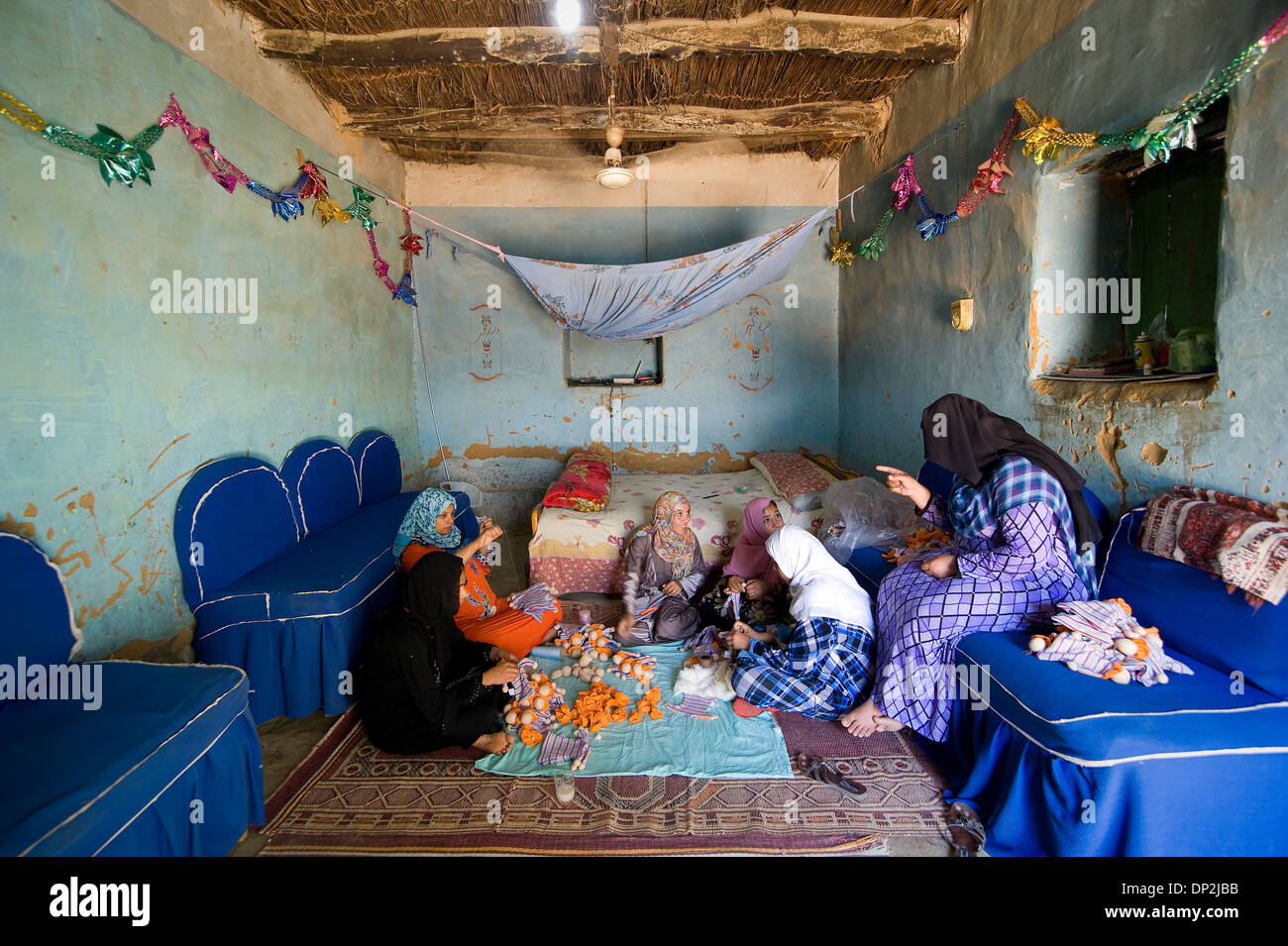 Bilbeis, Egypt: Young Egyptian women working as a seamstress at home ...