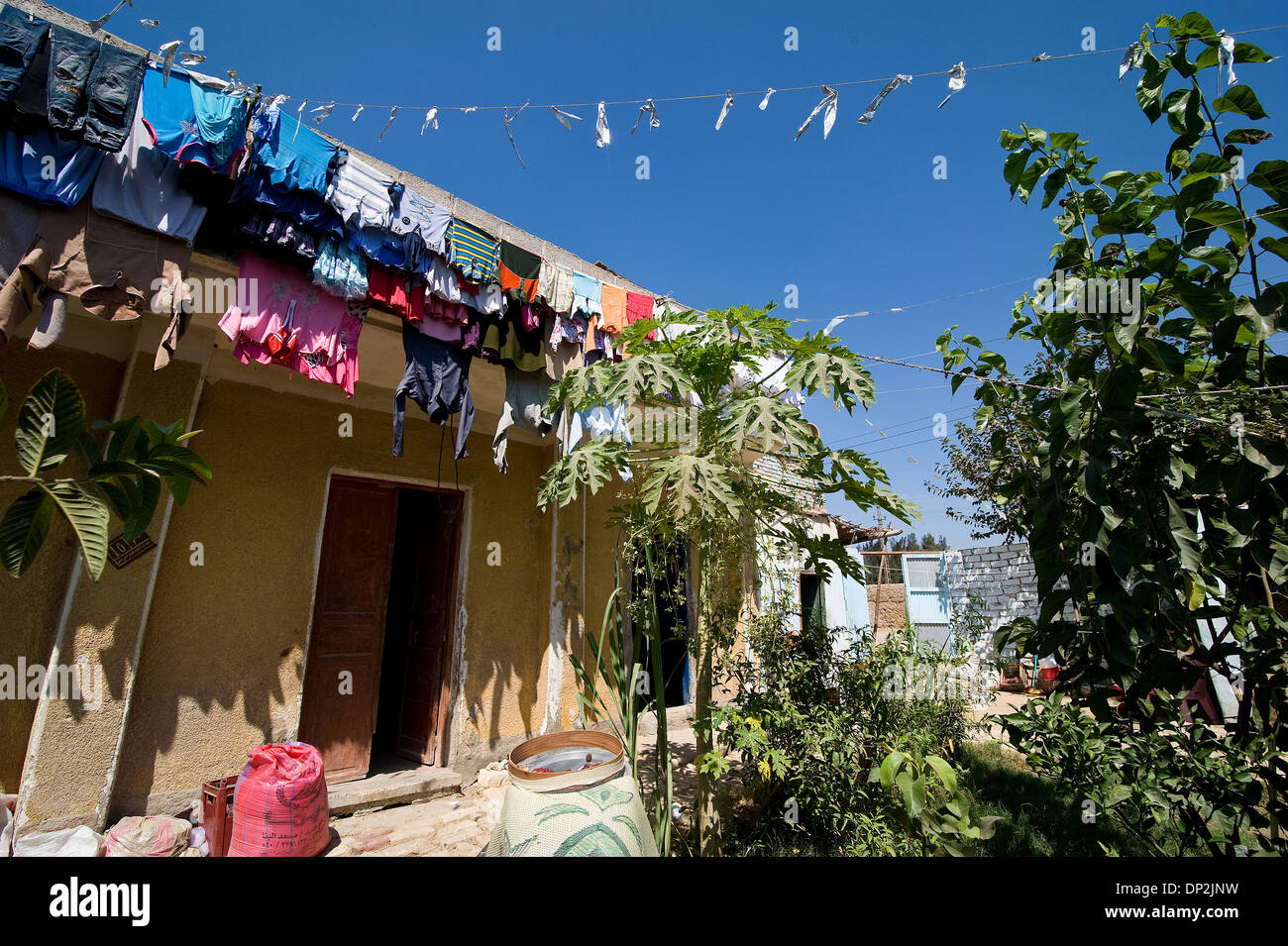 Family egypt washing clothes hi-res stock photography and images - Alamy