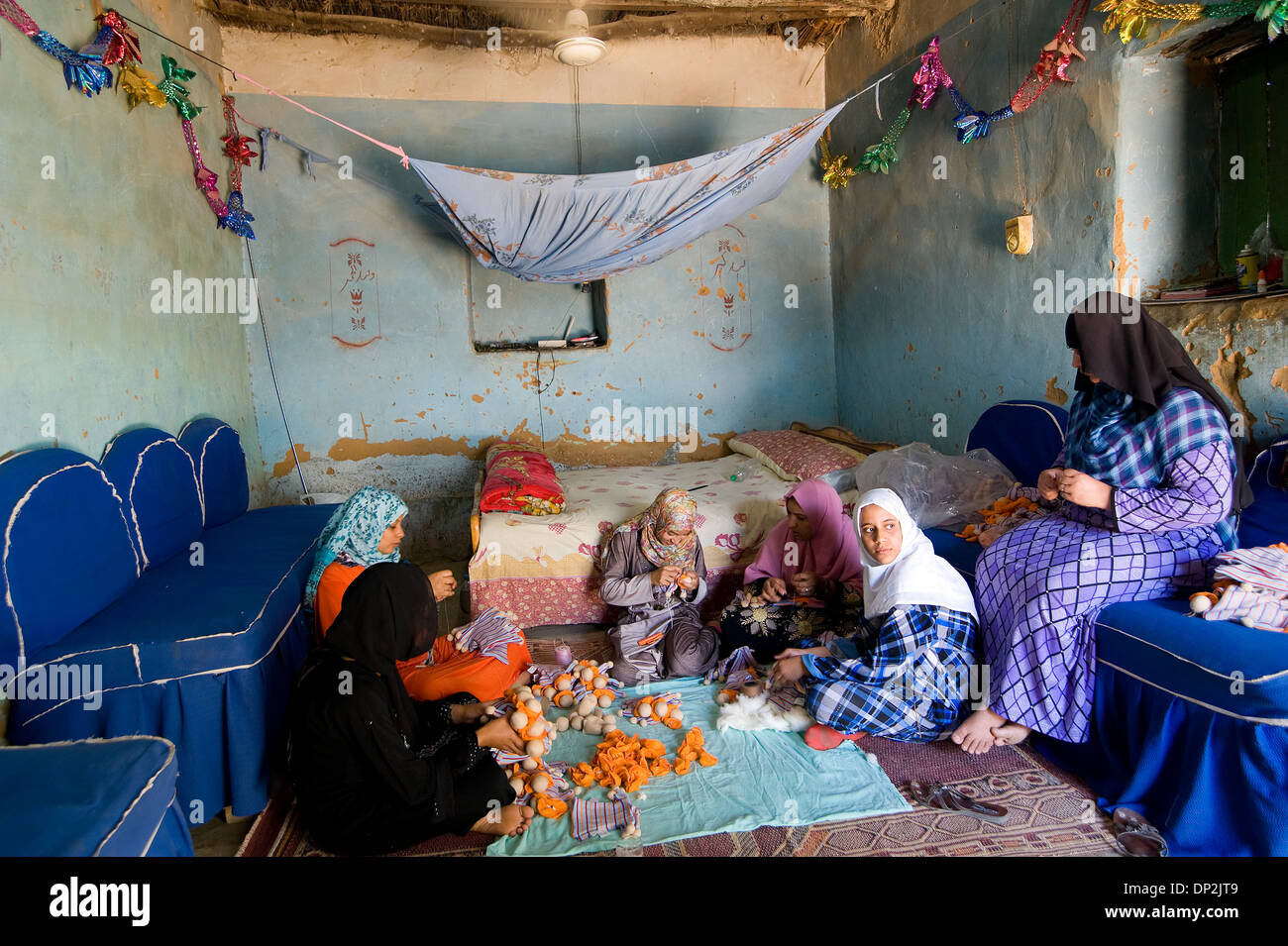 Bilbeis, Egypt: Young Egyptian women working as a seamstress at home ...