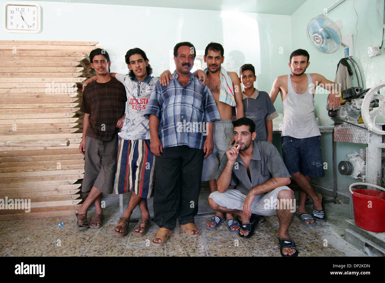 Jun 06, 2006; Baghdad, IRAQ; Iraqi bakery workers pose in a small ...