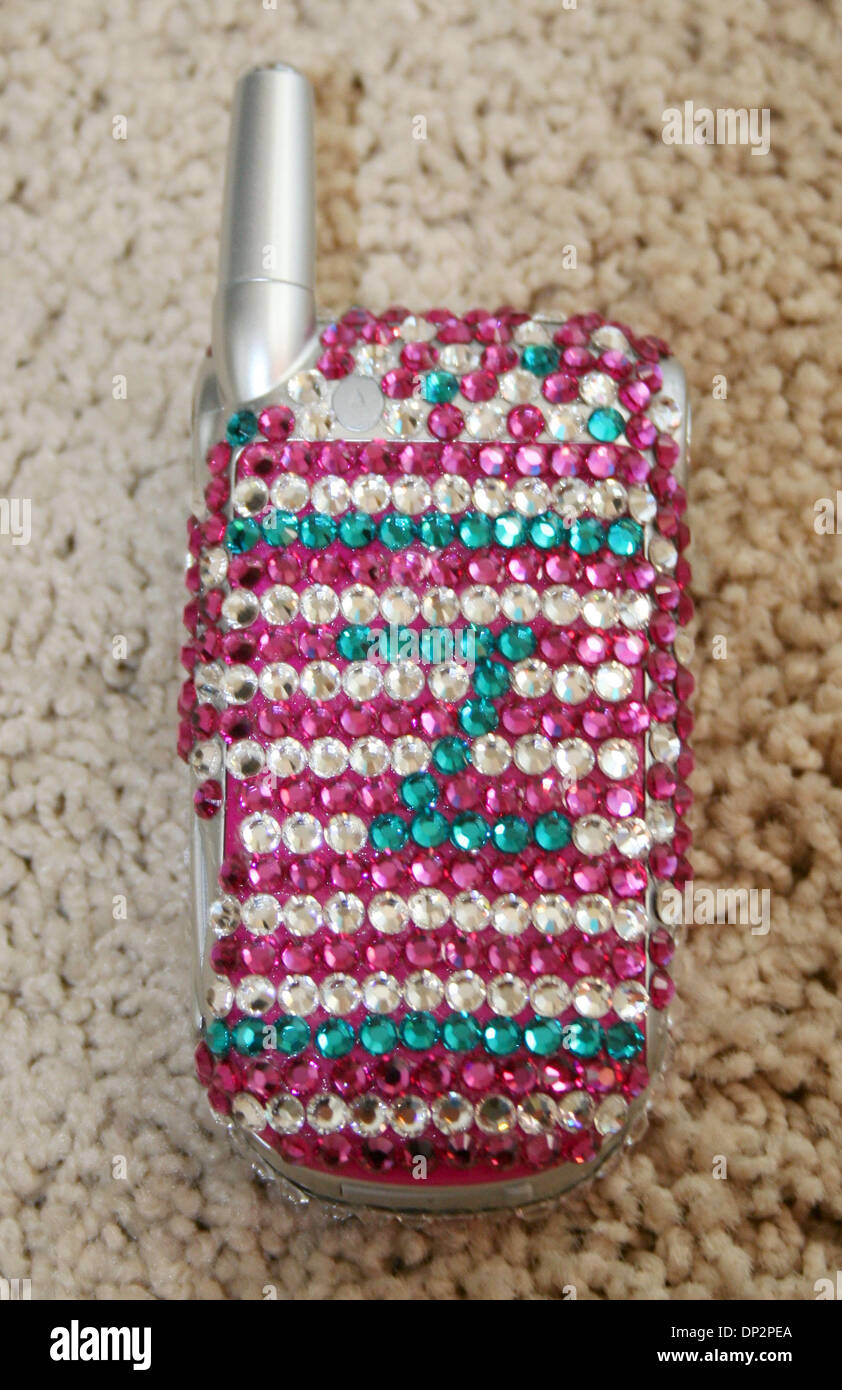 Jun 10, 2006; Laguna Beach, CA, USA; A cell phone gets decorated with ...