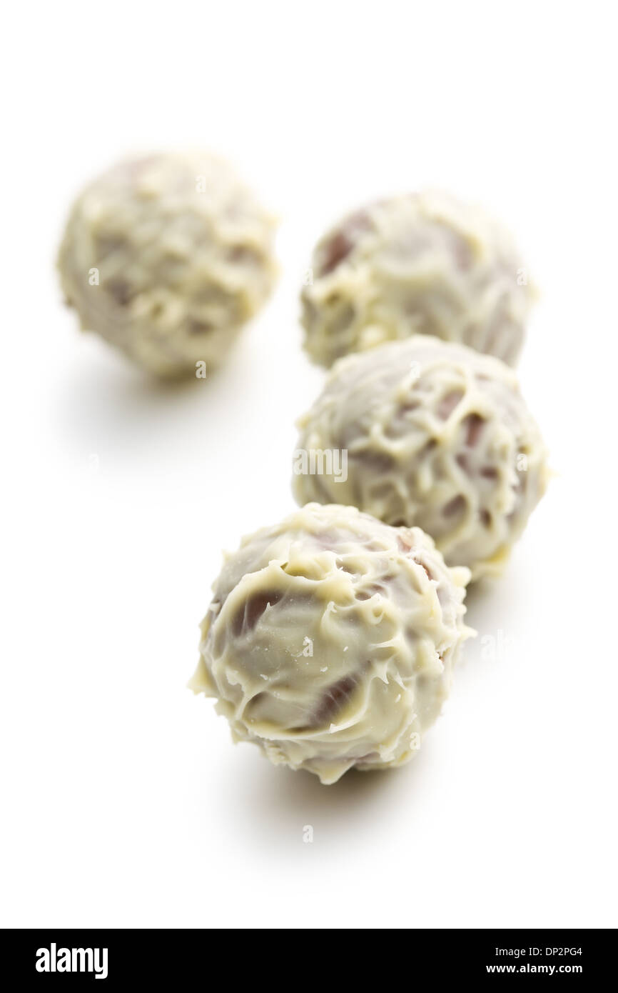 white chocolate truffles on white background Stock Photo - Alamy