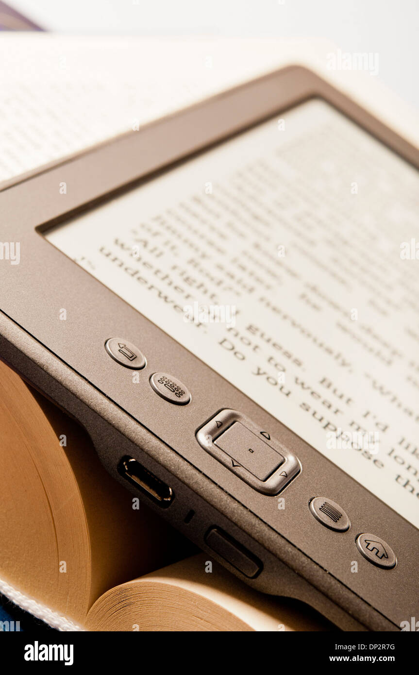 Kindle reader and book Stock Photo - Alamy