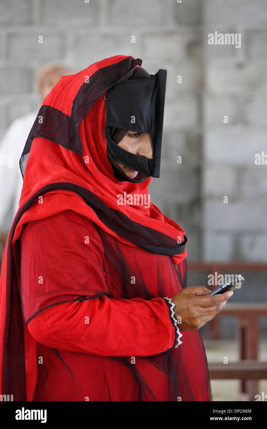 Omani woman with traditional burqa mask hi-res stock photography and ...