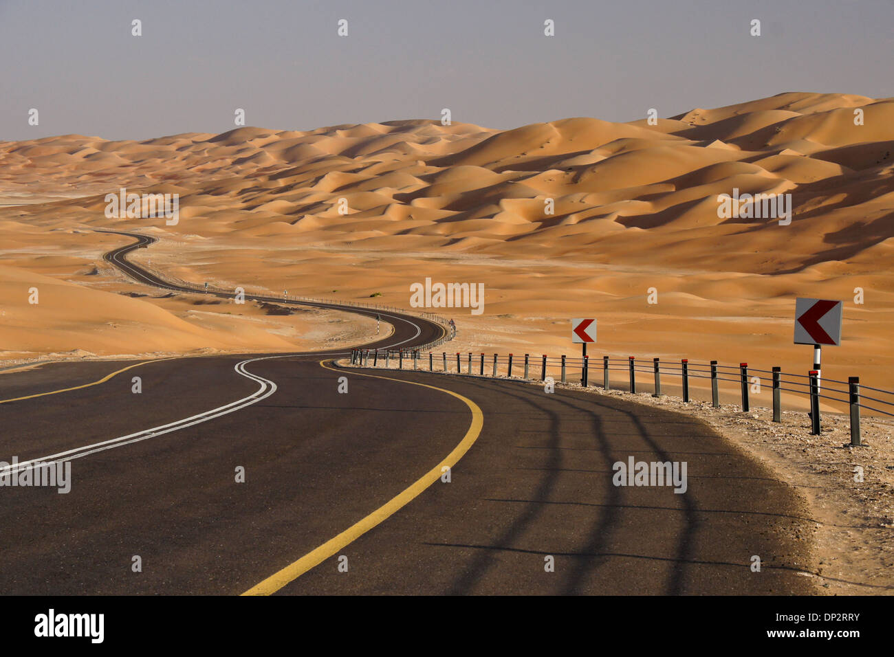 Road through sand dunes hi-res stock photography and images - Alamy