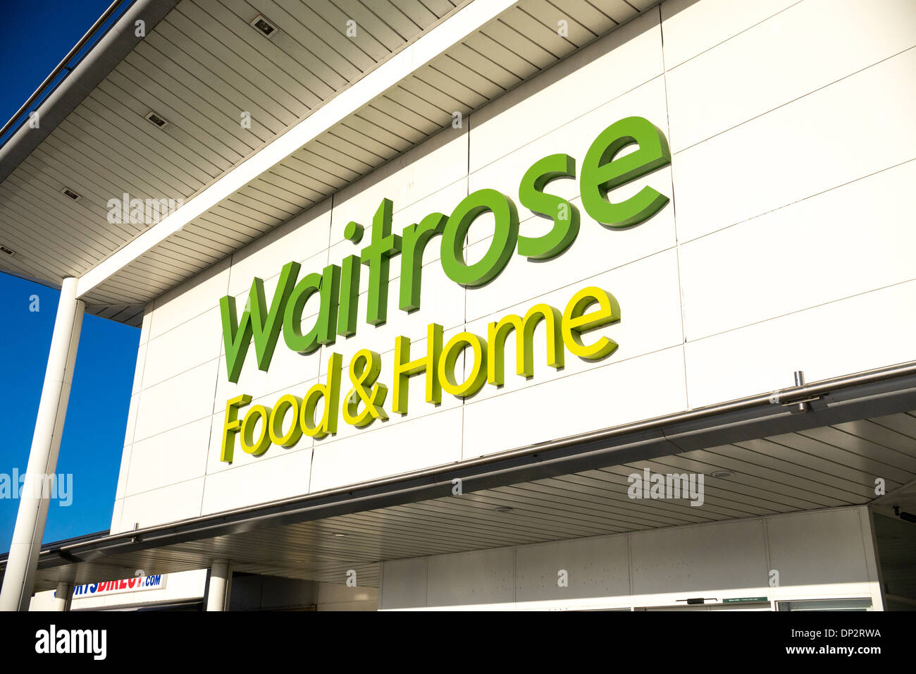 Waitrose supermarket sign and logo above UK store Stock Photo - Alamy