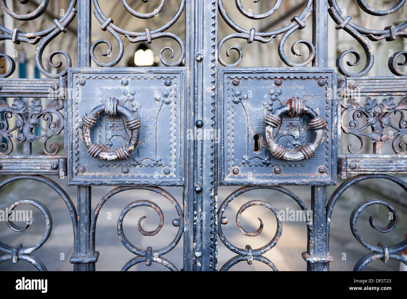 Wrought iron gates and locks Stock Photo - Alamy