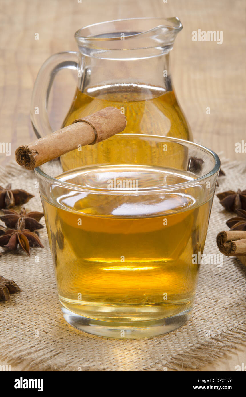 warm cider in a glass with a cinnamon stick Stock Photo - Alamy