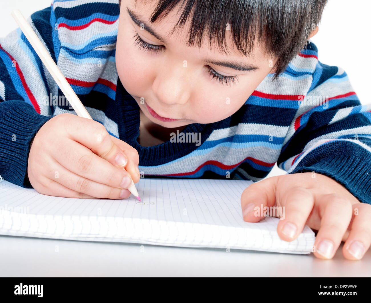 Young boy drawing Stock Photo - Alamy
