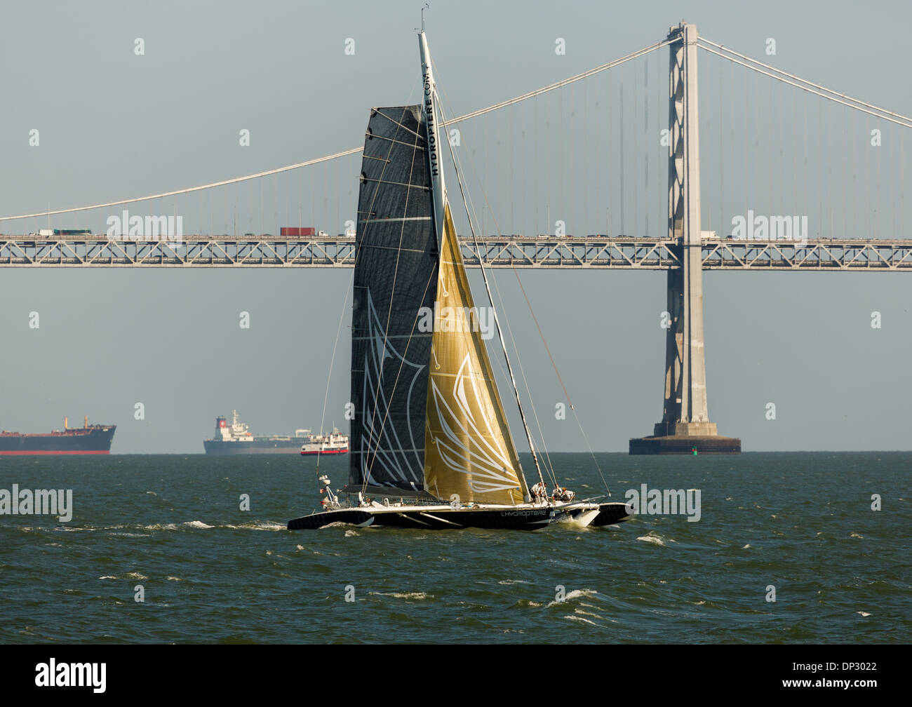 Sailboat portrayed in front of the San Francisco–Oakland Bay Bridge ...