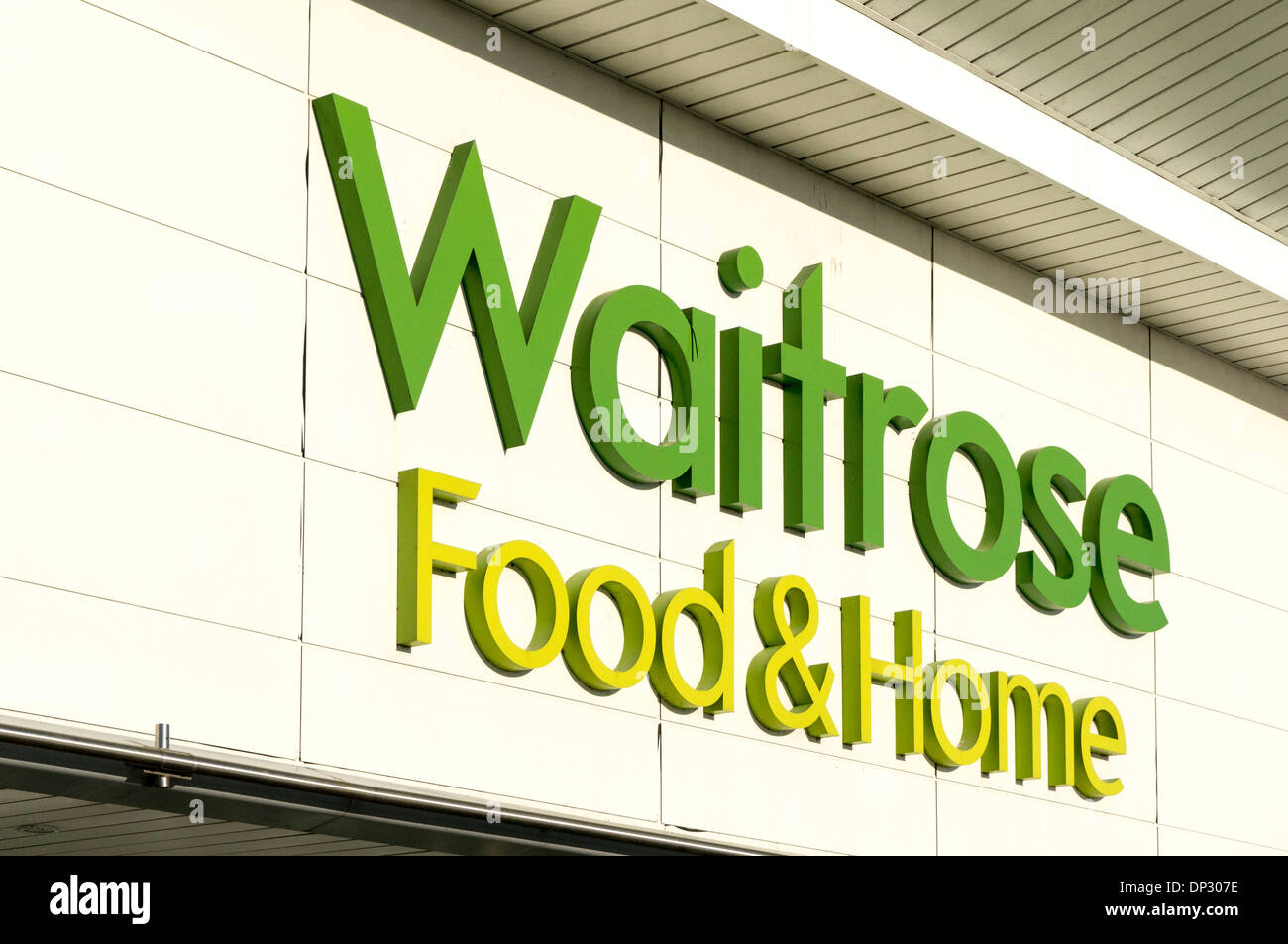 Waitrose supermarket sign and logo above UK store Stock Photo - Alamy