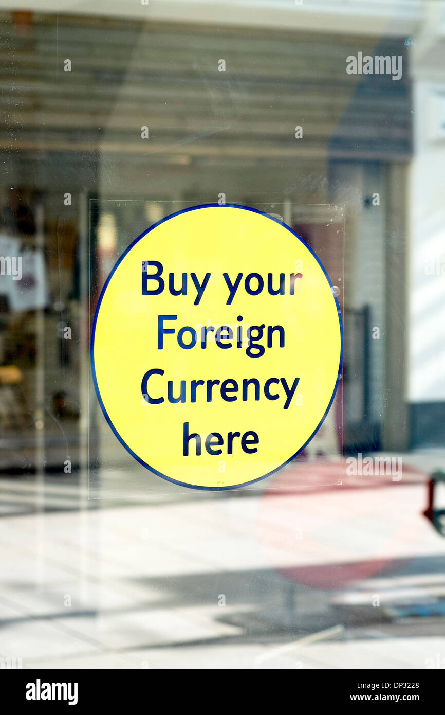 Circular sign in window advertising currency exchange facility Stock ...
