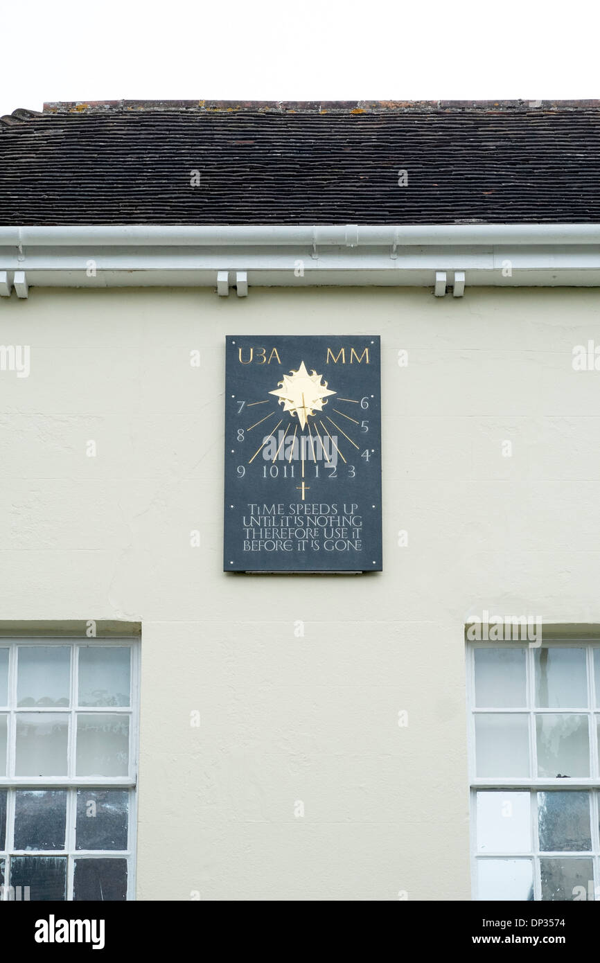 Ornate sun dial on the wall of a building Stock Photo - Alamy