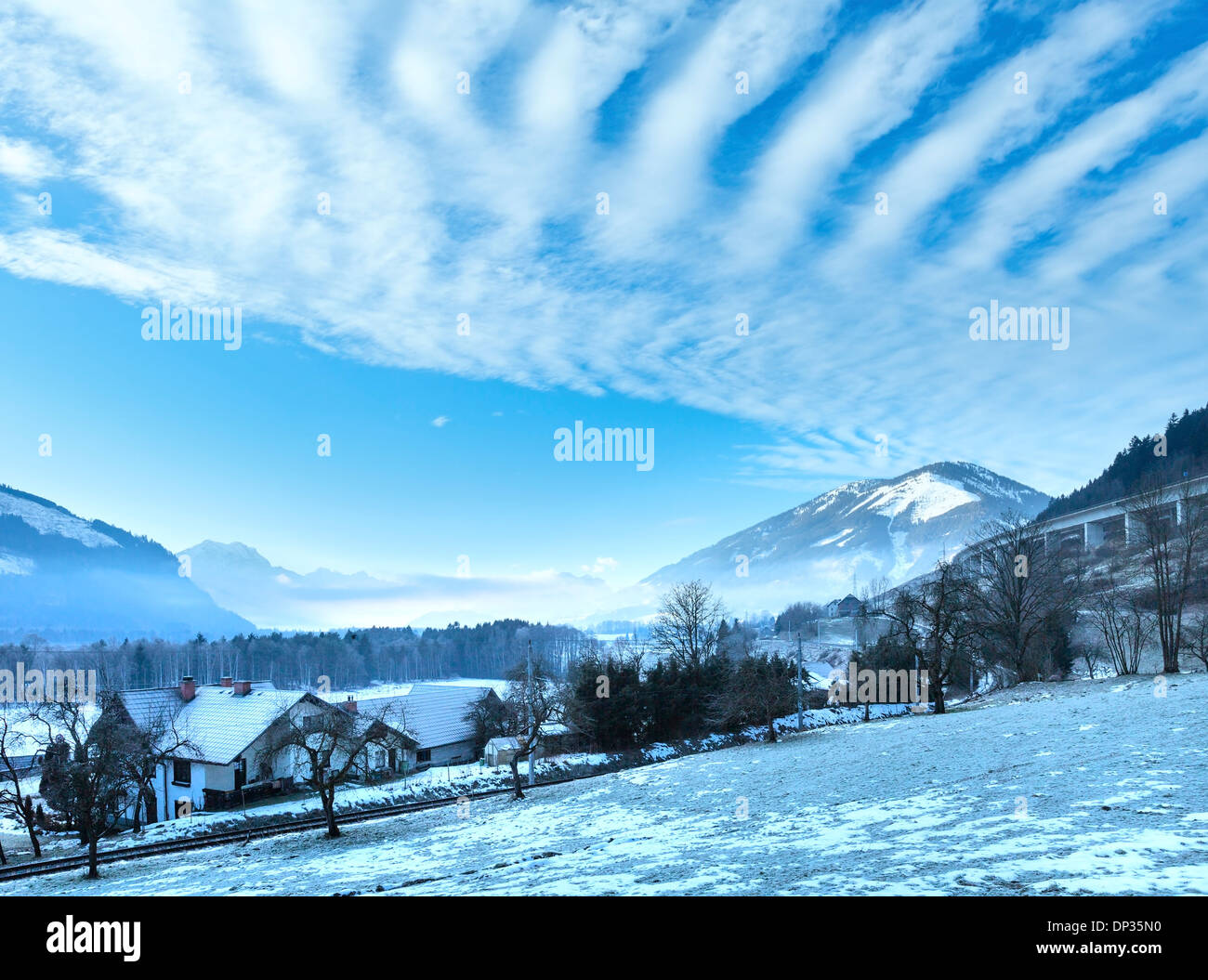 Winter mountain village hazy landscape (Austria Stock Photo - Alamy
