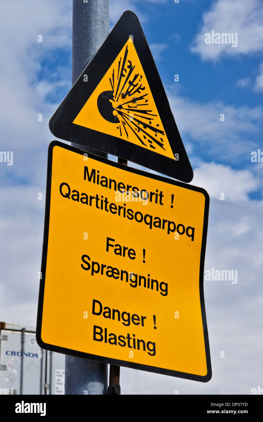 Warning sign in Greenlandic, Danish, and English Stock Photo - Alamy