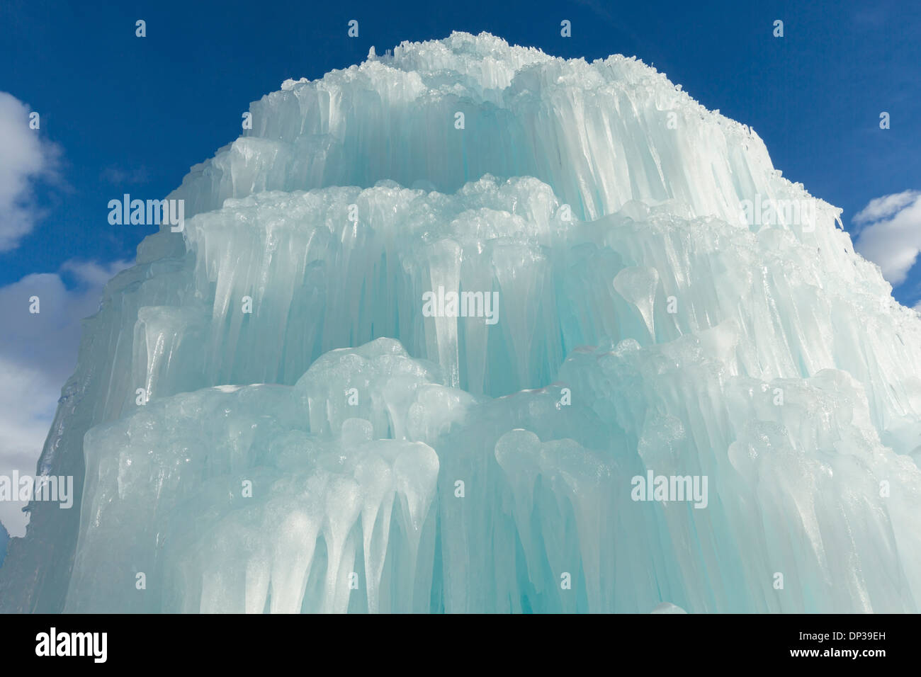 Frozen water in fountain (ice waterfall) on sky background Stock Photo ...