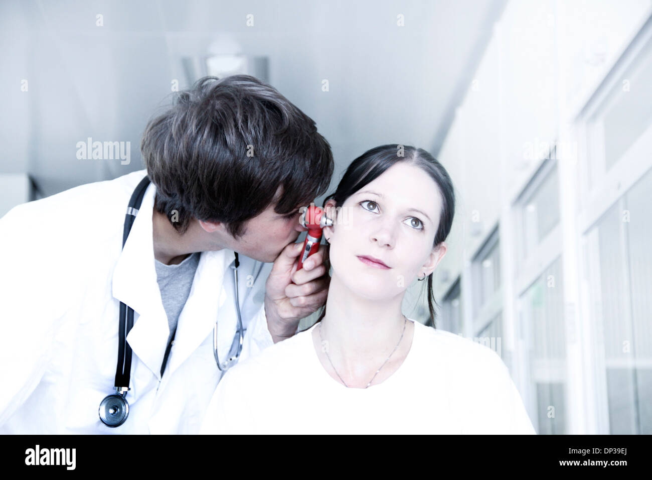 Doctor ear examination hi-res stock photography and images - Alamy