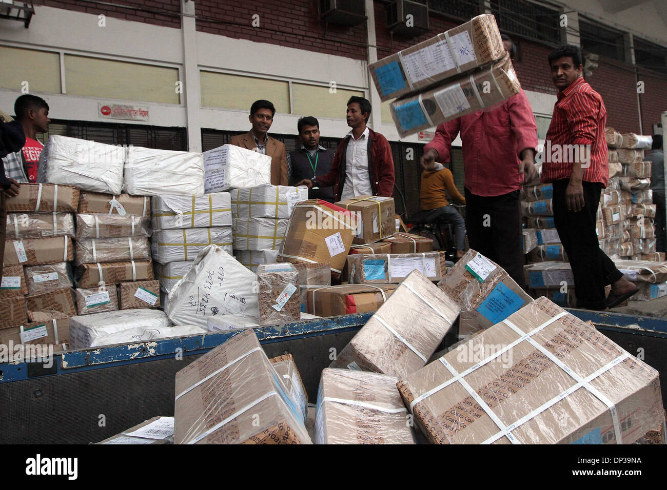 Workers unloading import material of Biman cargo complex on Hazrat ...