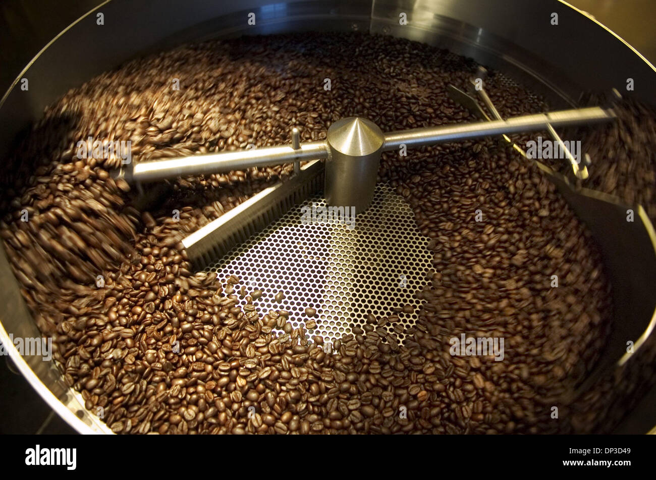Jun 29, 2006; Lincoln, CA, USA; Freshly roasted coffee beans are cooled ...