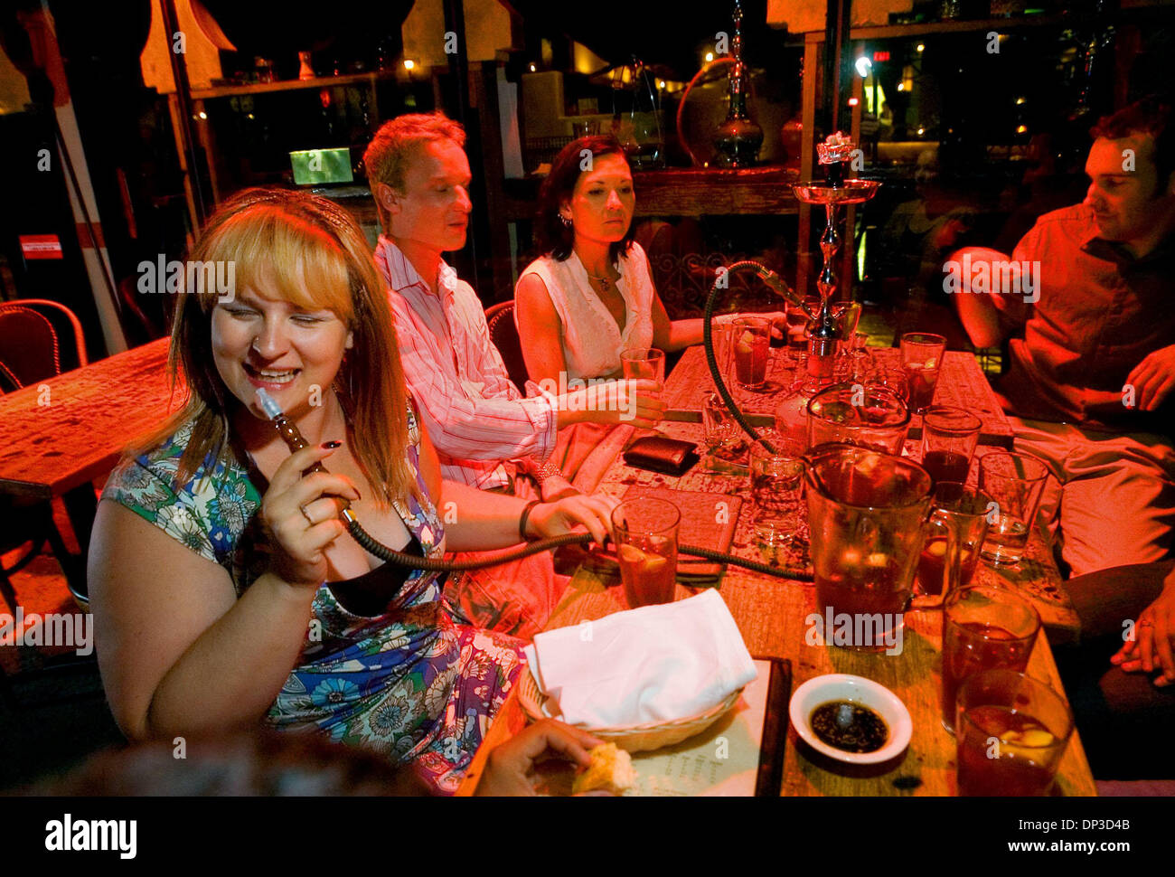 Jun 29, 2006; Sacramento, CA, USA; Jen Waldhaus left, enjoys a hookah ...