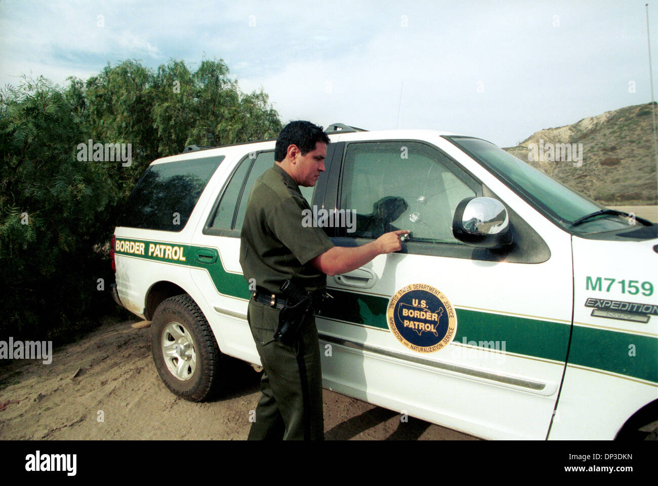 Jul 03, 2006; San Diego, CA, USA; Two U.S. Border Patrol agents under ...