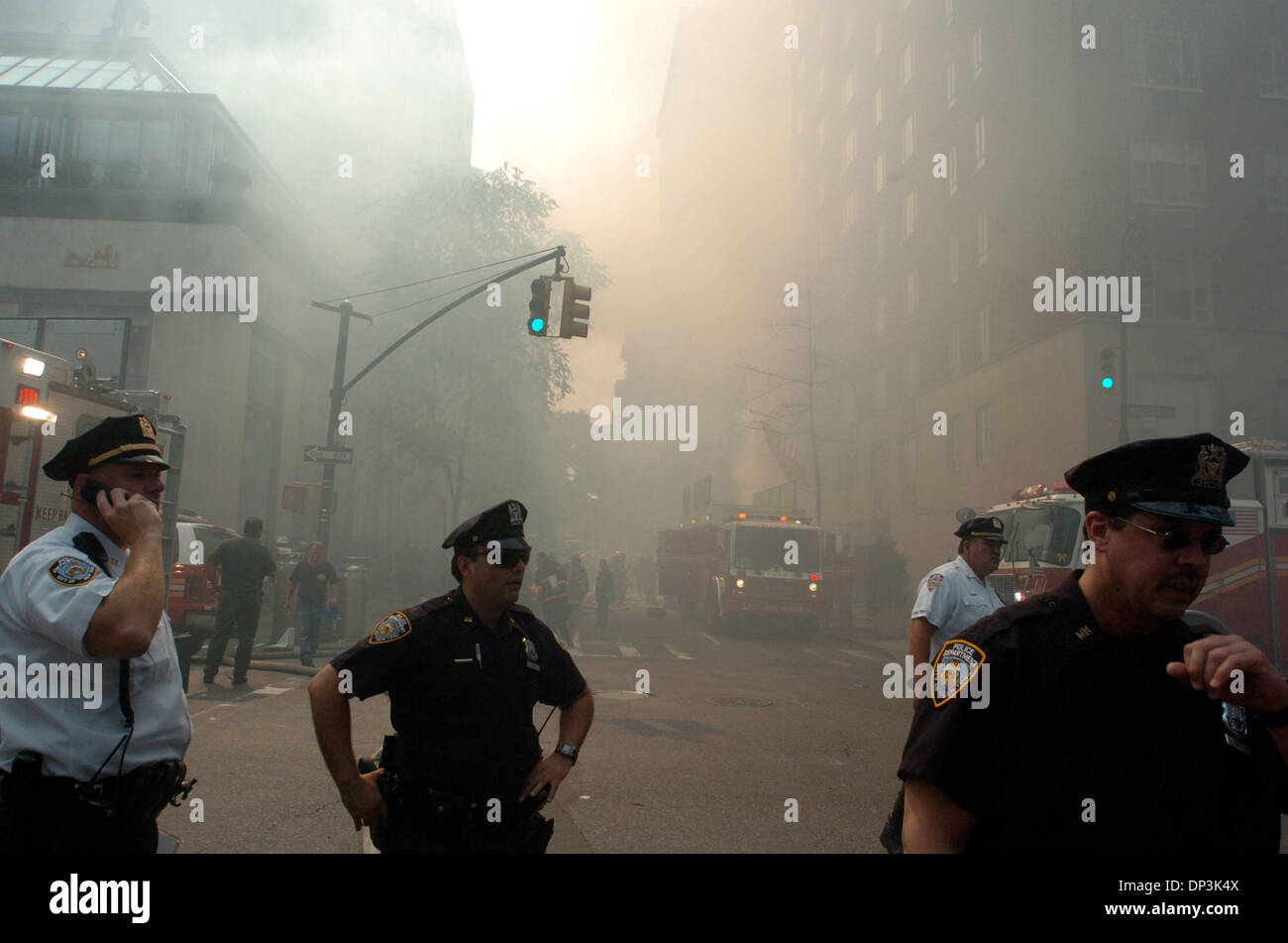 Jul 10, 2006; Manhattan, NY, USA; Firefighters work to put out a fire ...