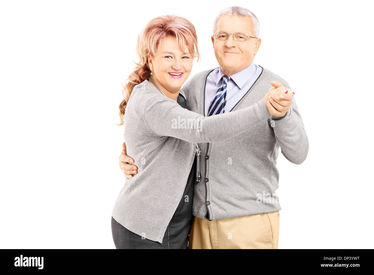 Middle aged couple dancing isolated on white background Stock Photo - Alamy