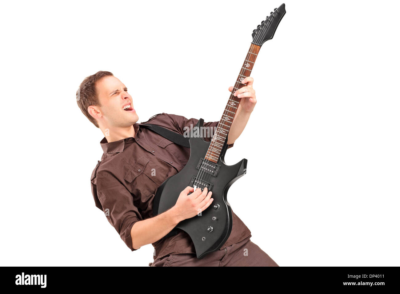 Young man playing on electric guitar Stock Photo - Alamy