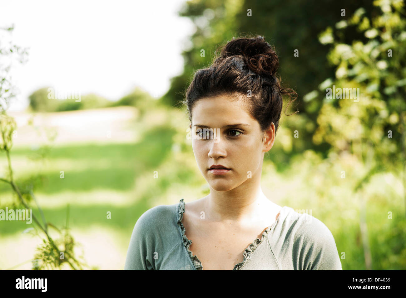 Girl staring into the distance hi-res stock photography and images - Alamy