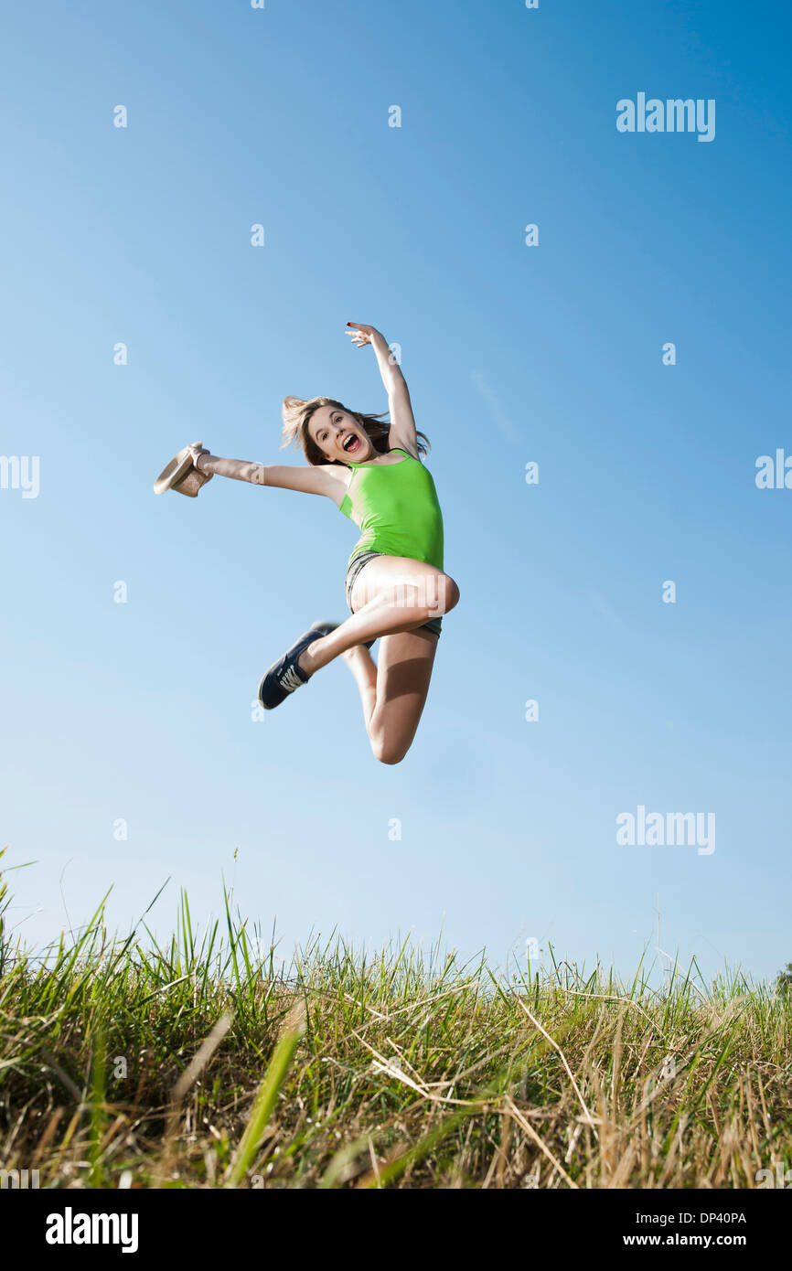 15 year old girl jumping hi-res stock photography and images - Alamy