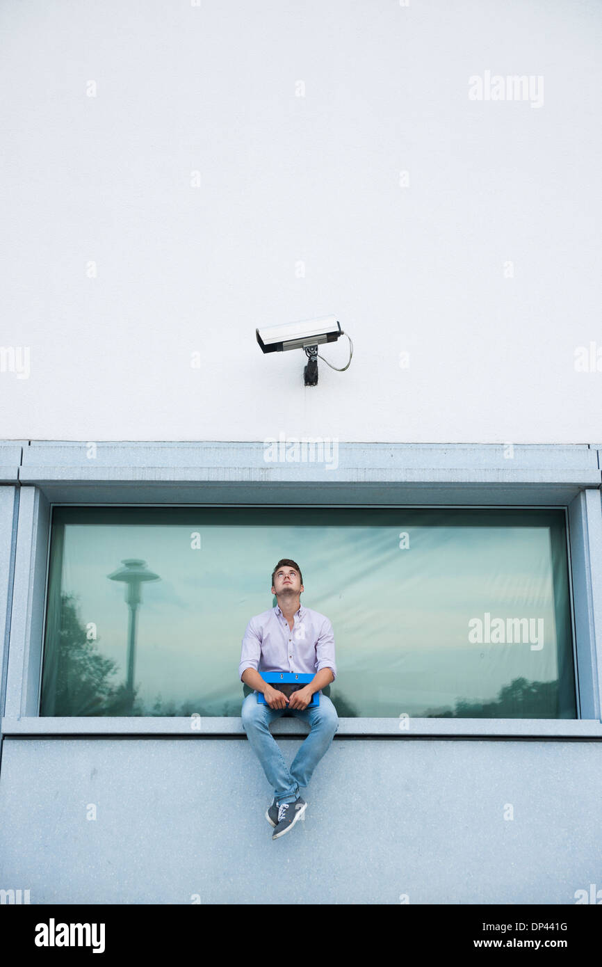 Man Sitting On Window Ledge High Resolution Stock Photography and ...