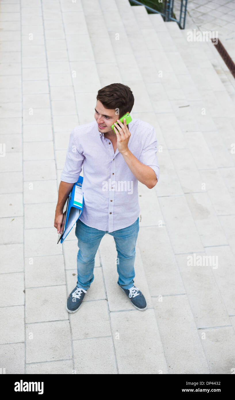 Phone full length hanging hi-res stock photography and images - Alamy