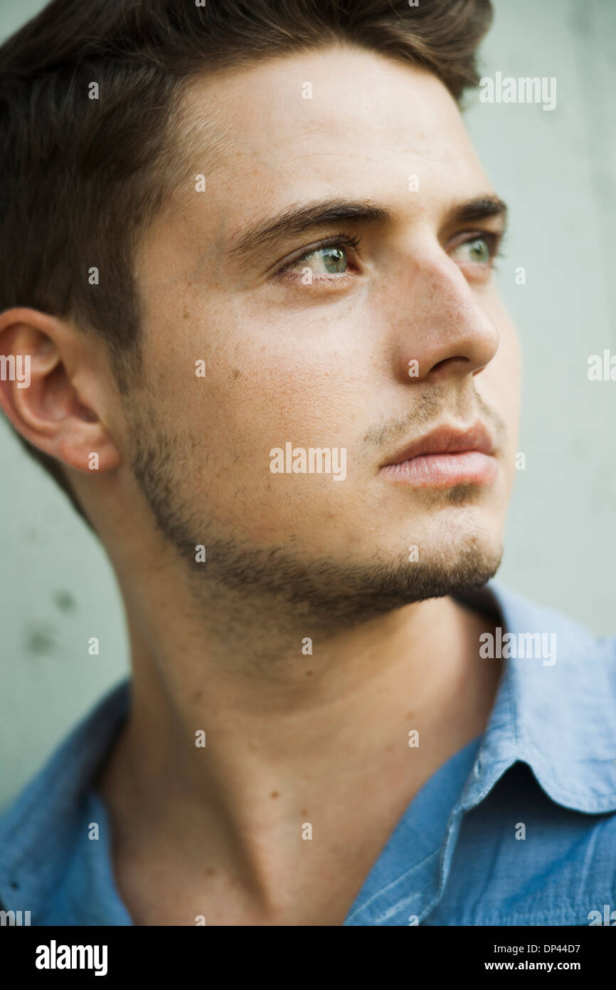Close-up portrait of young man outdoors, Germany Stock Photo - Alamy