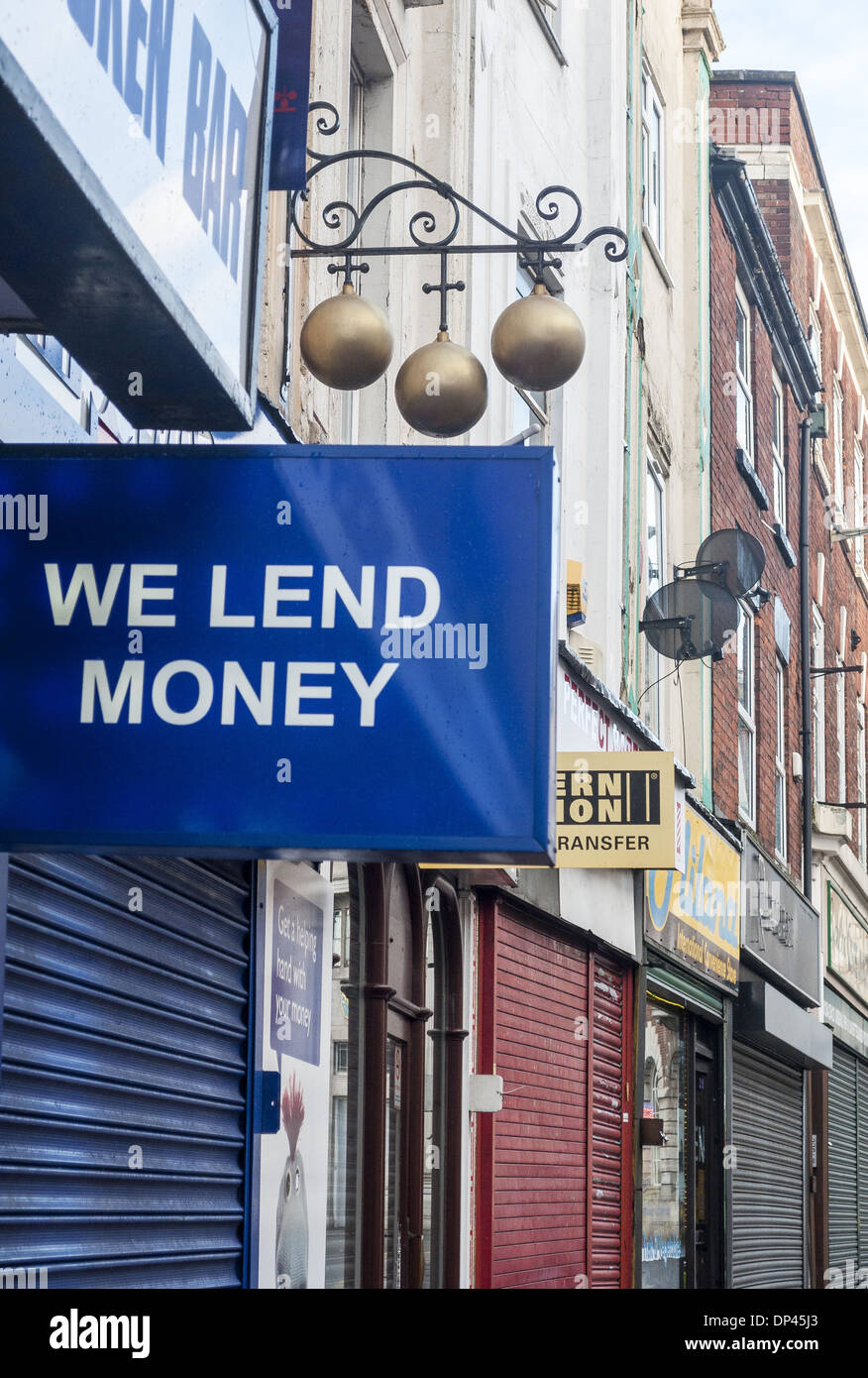 Pawnbroker sign and symbol on shop front in Dudley, West Midlands, UK ...