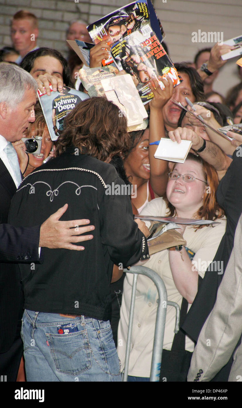 Jul 27, 2006; New York, NY, USA; Actor JOHNNY DEPP signs autographs for ...