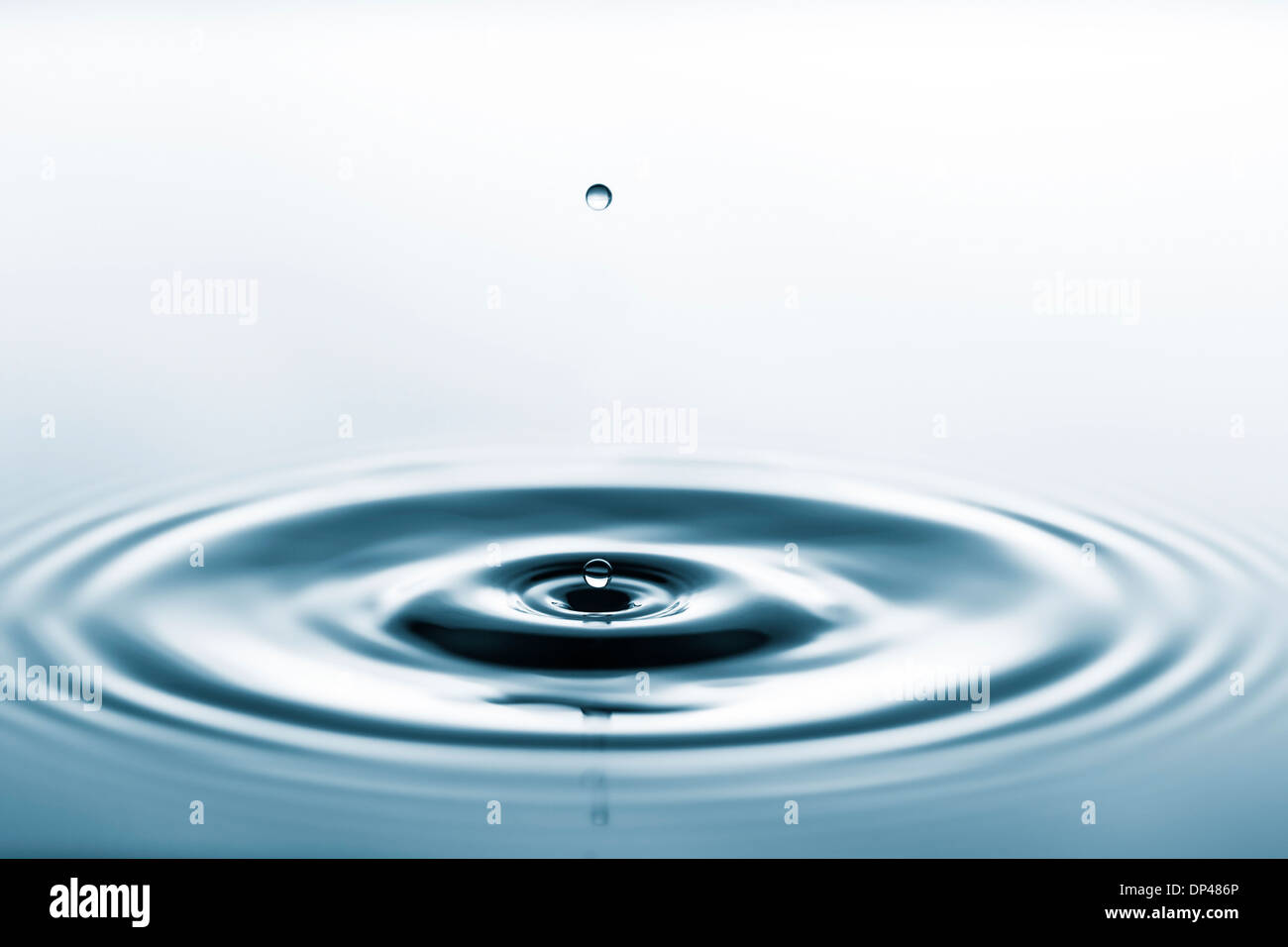 Water drop impact Stock Photo - Alamy