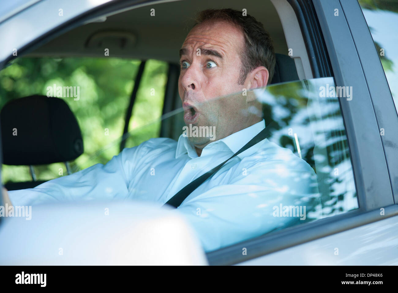 Surprised Businessman Driving Car, Mannheim, Baden-Wurttemberg, Germany ...