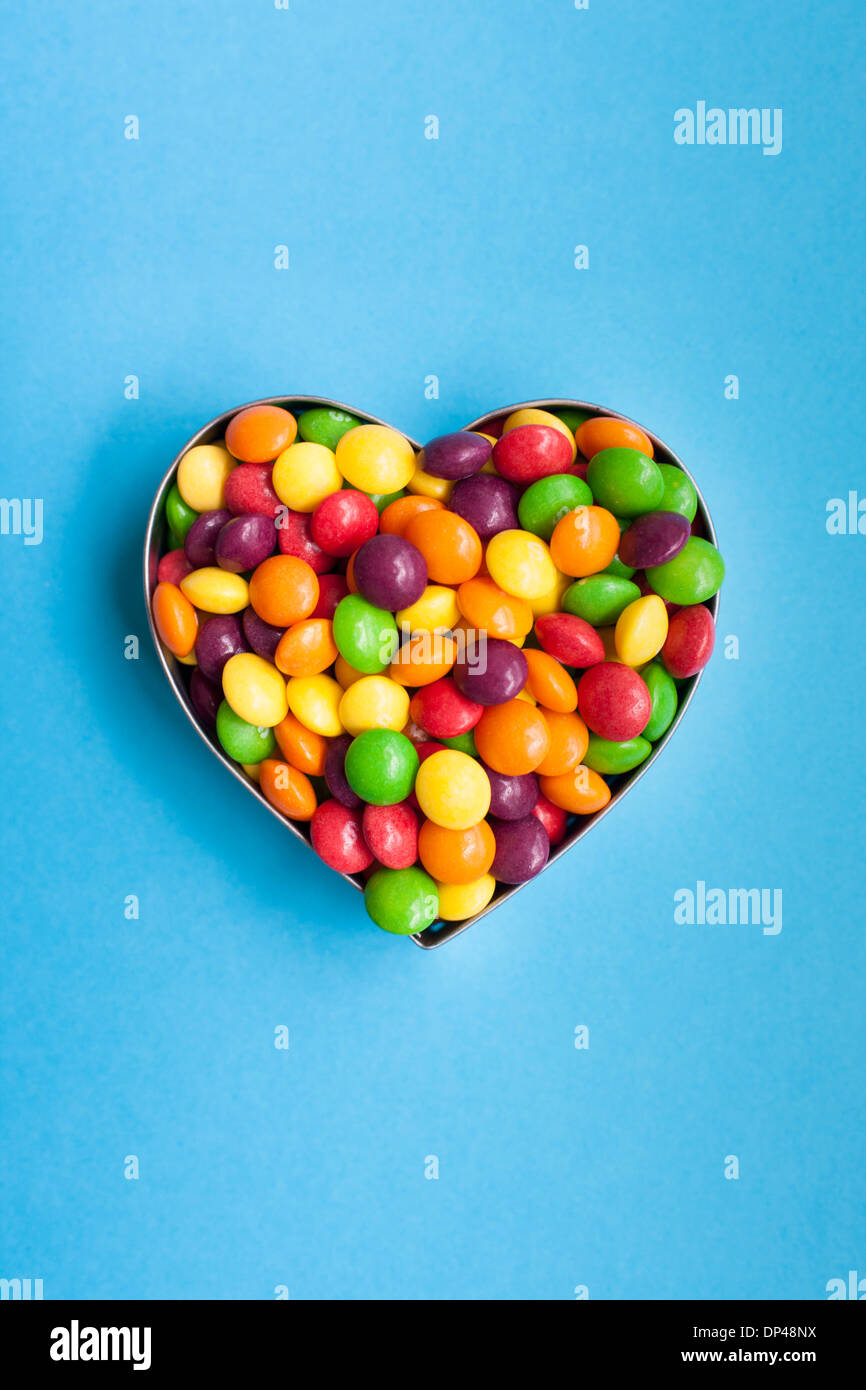 Sweets in a heart shape Stock Photo - Alamy