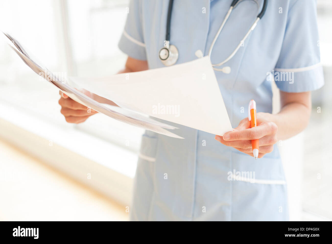 Paperwork hospital nurse hi-res stock photography and images - Alamy